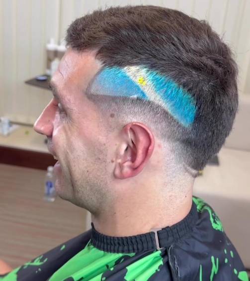 Dos colombianos están detrás del original corte del Dibu Martínez en Qatar